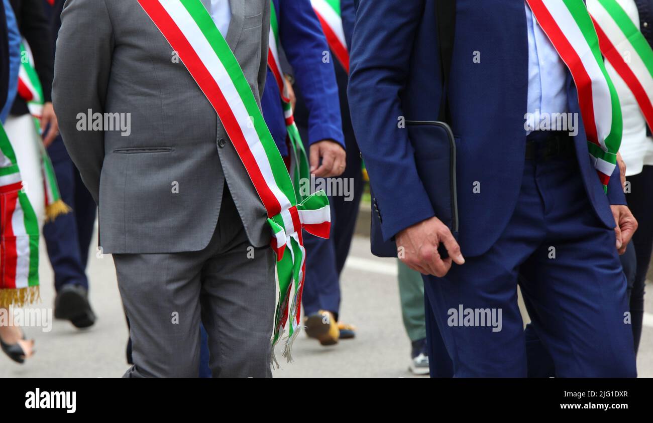 Many italian MAYORS with stripe called MAYORAL CREST during parade ...