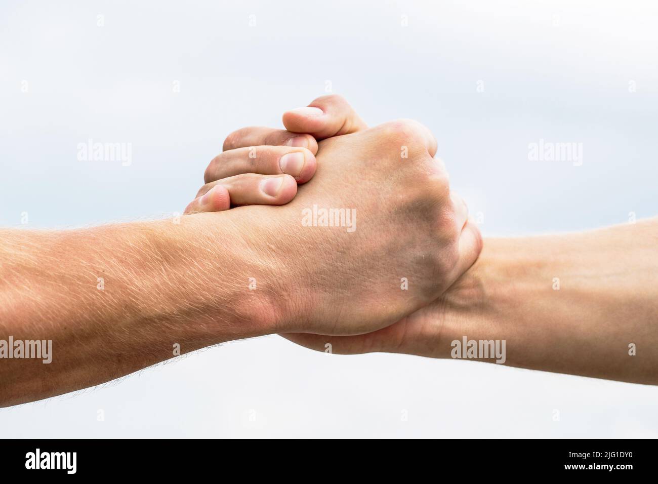 Rescue, helping gesture or hands. Two hands, helping arm of a friend ... Rescue, helping gesture or hands. Two hands, helping arm of a friend ...