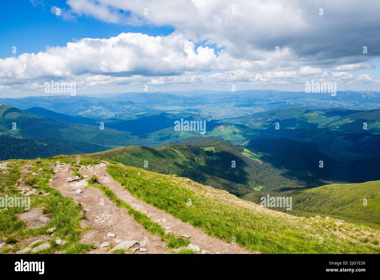 Mountain path. Springtime landscape in mountains. Landscape in green ...