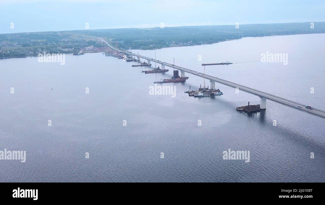 A big long bridge.Clip. View from a helicopter .A huge bridge passing ...