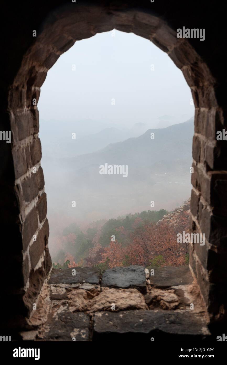 Looking out the guard tower of the Great Wall of China Stock Photo - Alamy