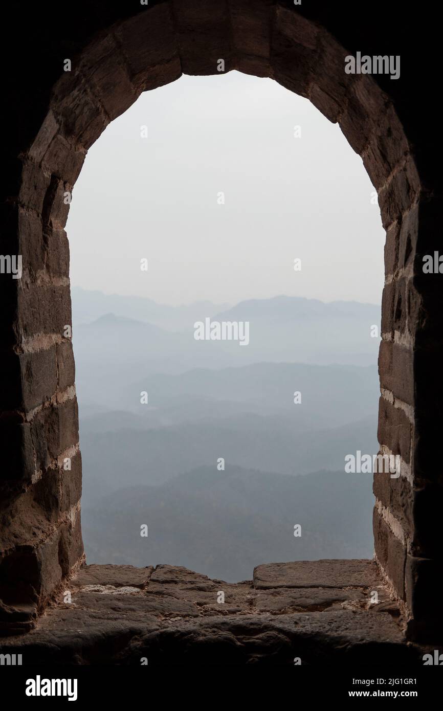 Looking out the guard tower of the Great Wall of China Stock Photo - Alamy