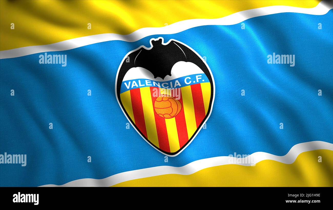 Close up of waving flag with Valencia CF football club logo. Motion ...