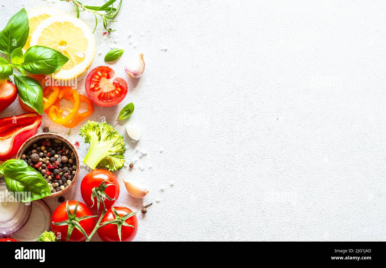 Food cooking background on white table Stock Photo - Alamy