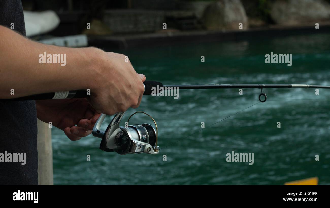 Fisherman with a fishing rod hi-res stock photography and images - Alamy