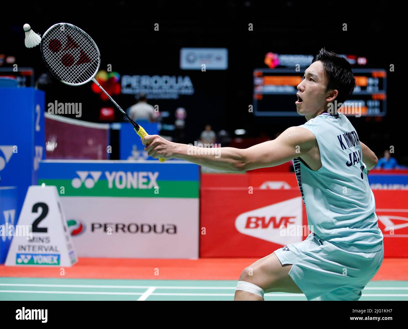Kento Momota of Japan competes against Koki Watanabe of Japan during ...