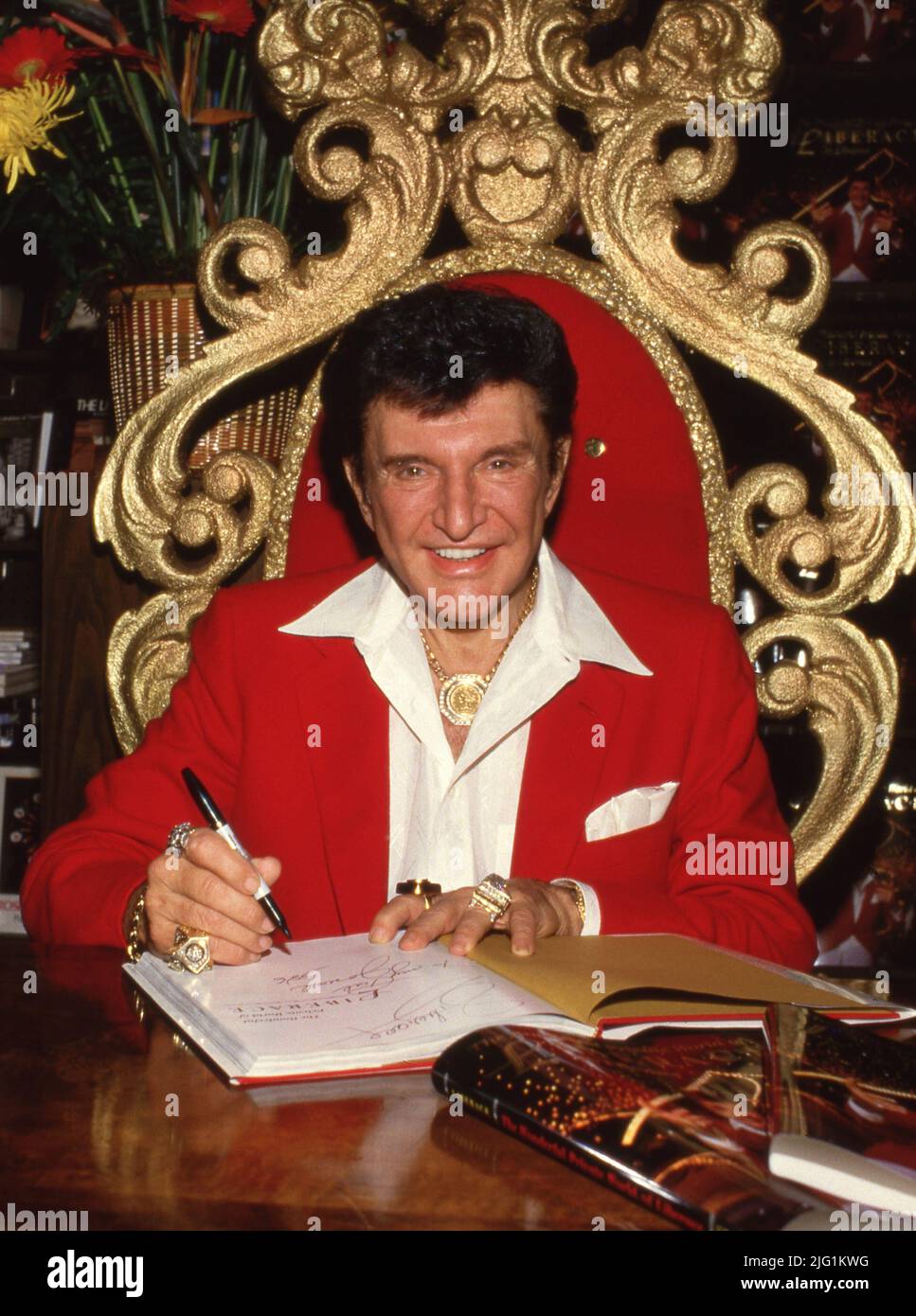 Liberace at his book signing for The Wonderful Private World of ...