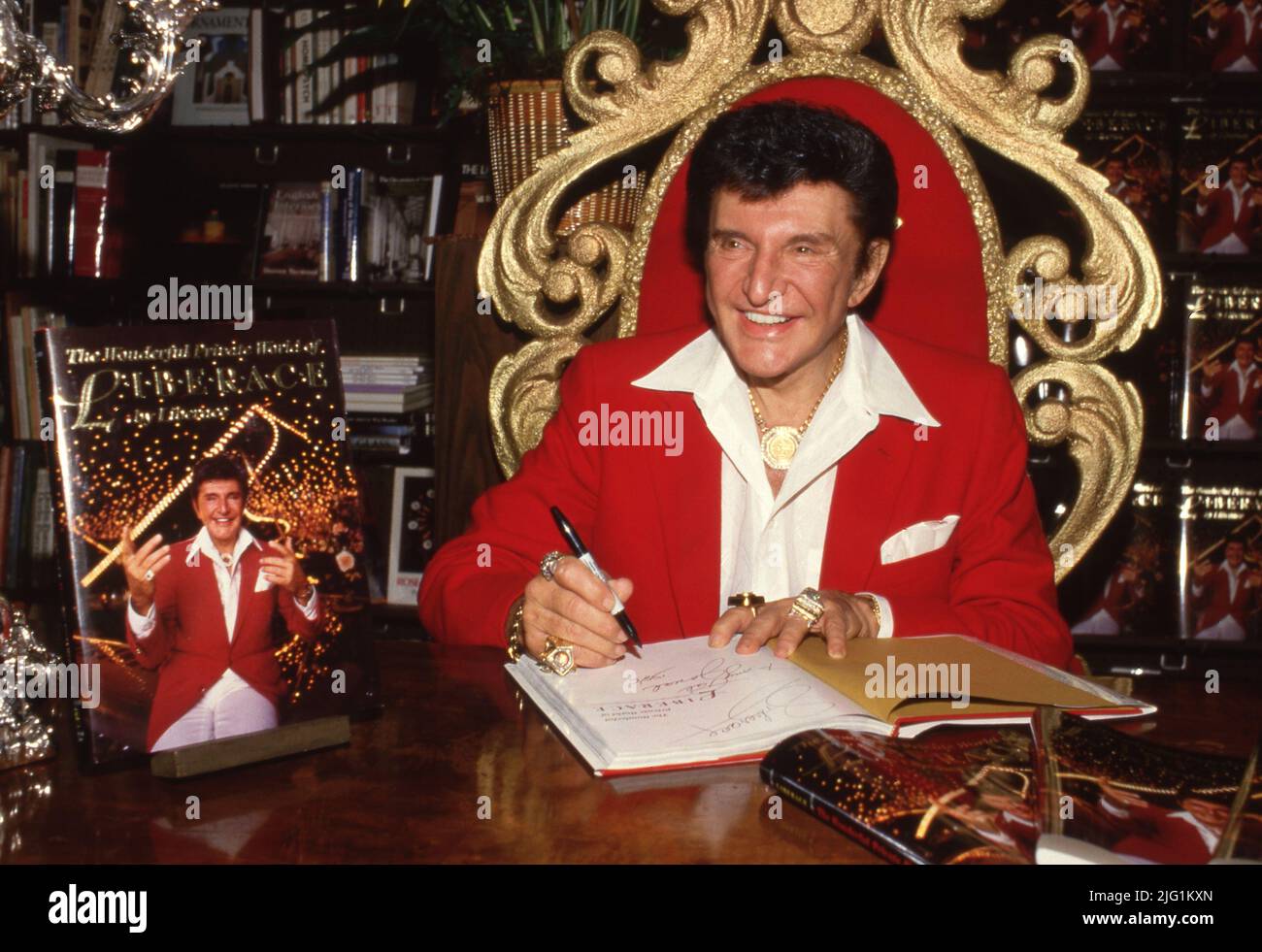 Liberace at his book signing for The Wonderful Private World of ...