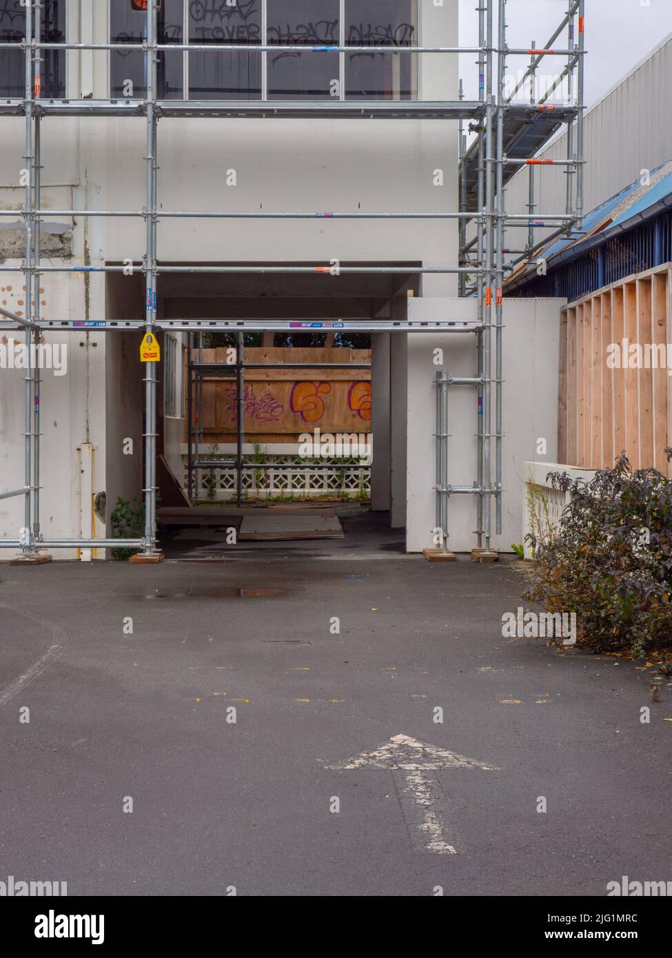 Scaffolding Over A Building Drive Through Stock Photo - Alamy