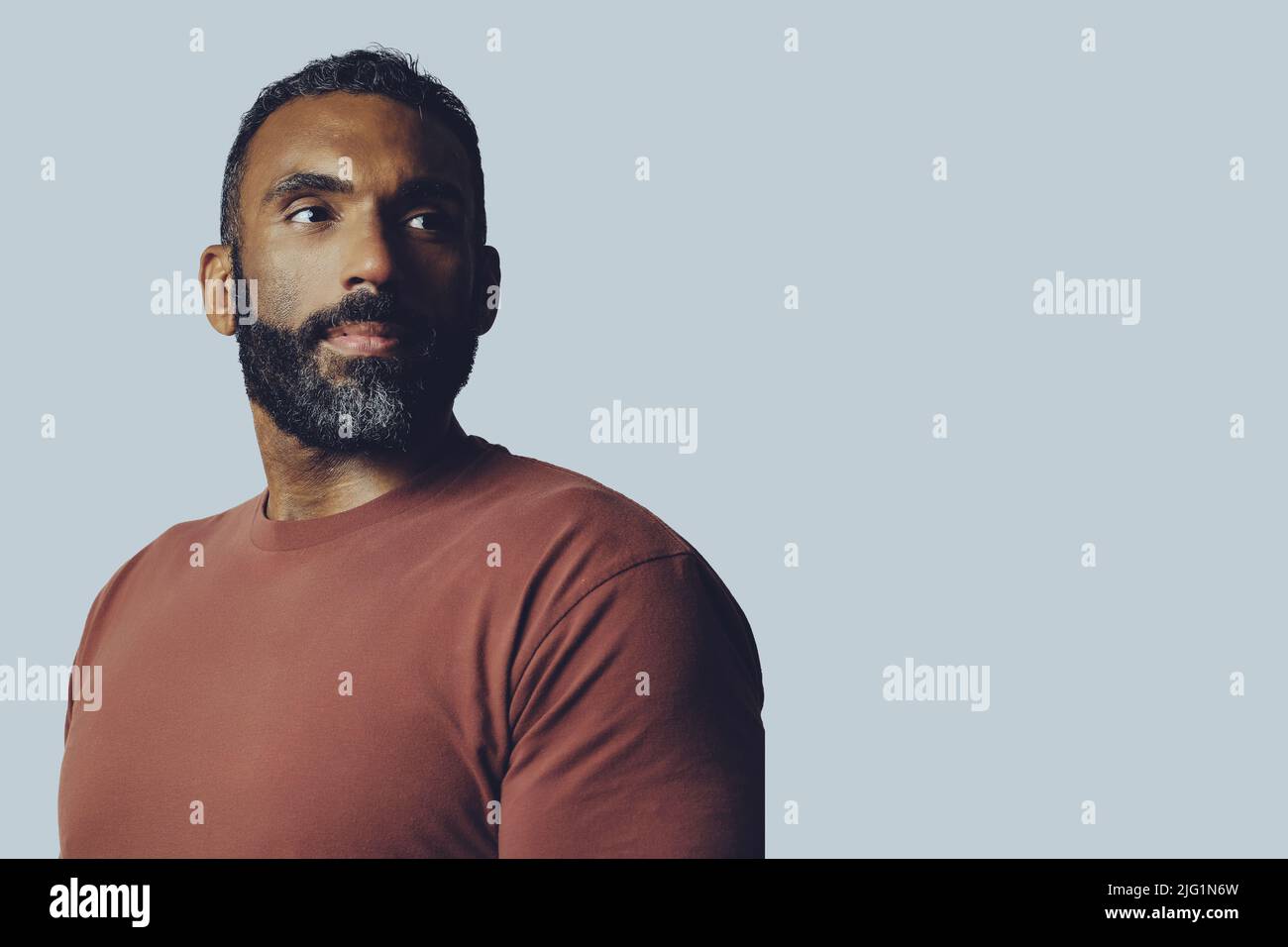 headshot portrait of a handsome thoughtful bearded mid adult man ...