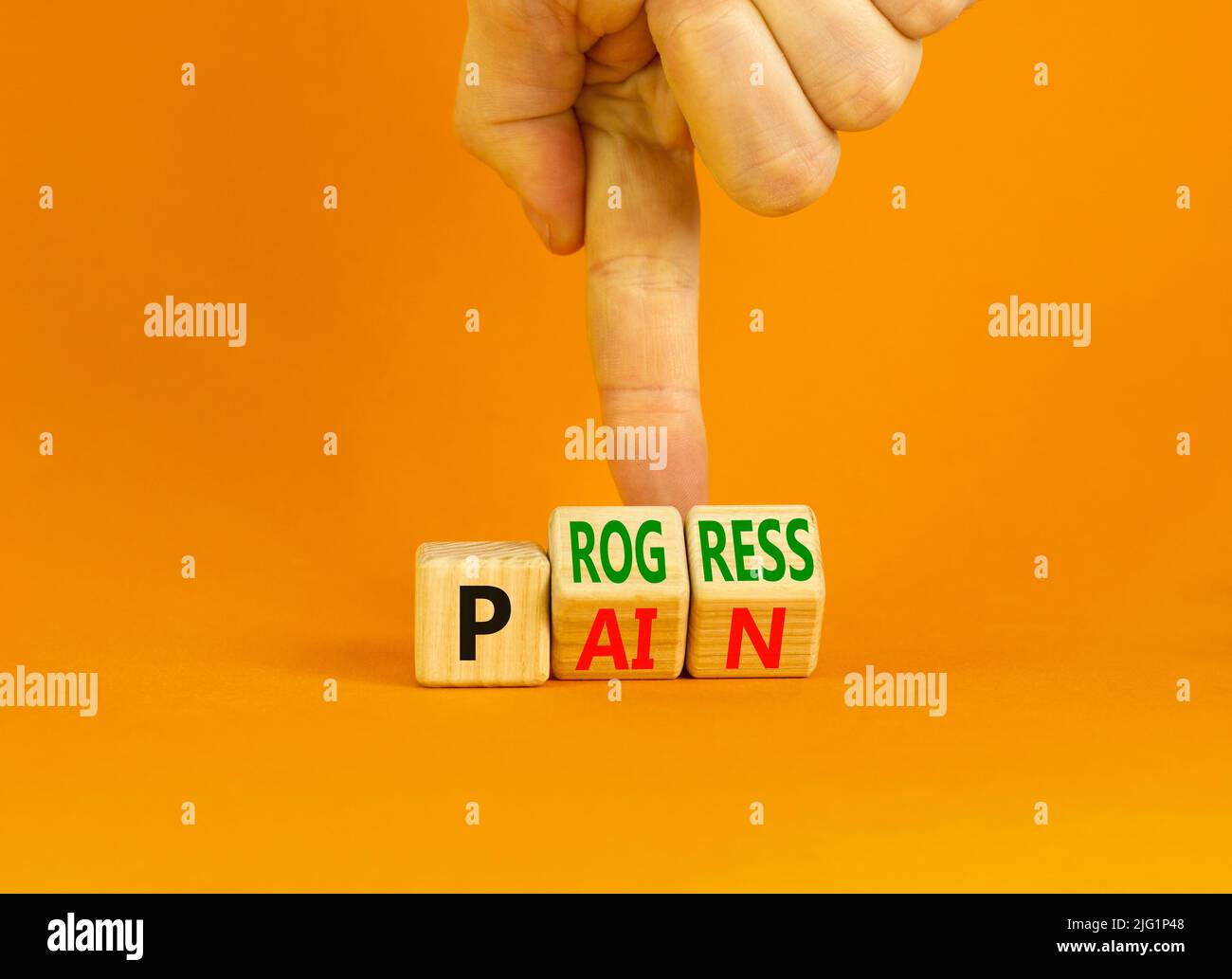 Pain or progress symbol. Concept words Pain or Progress on wooden cubes ...