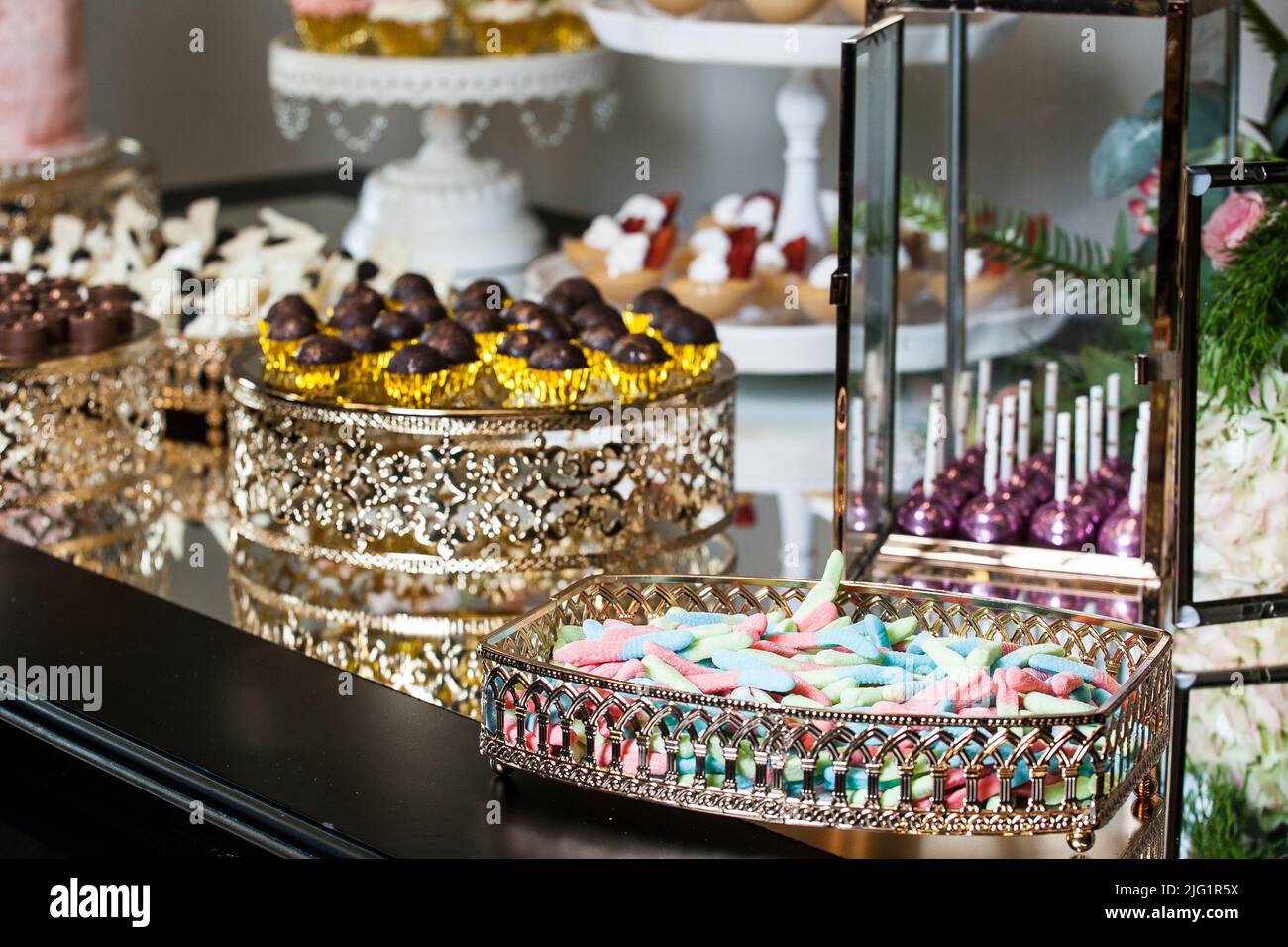 Party decorations; Candy table, table with various sweets and cakes ...