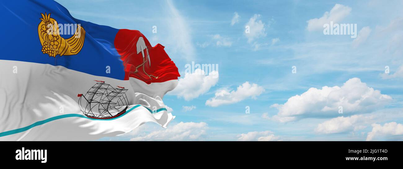 official flag of Auckland New Zealand at cloudy sky background on ...