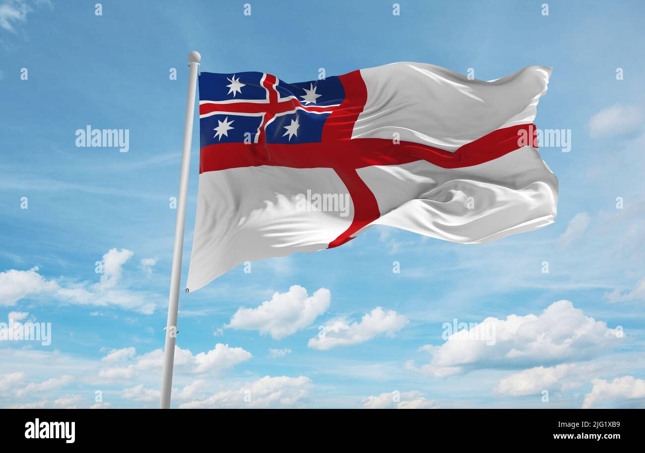 official flag of United Tribes New Zealand at cloudy sky background on ...