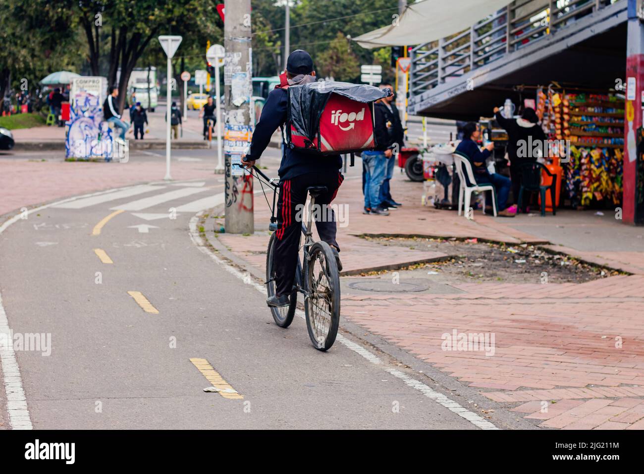 People cycling on the bike route of the 80´ street, July 2, 2022 ...