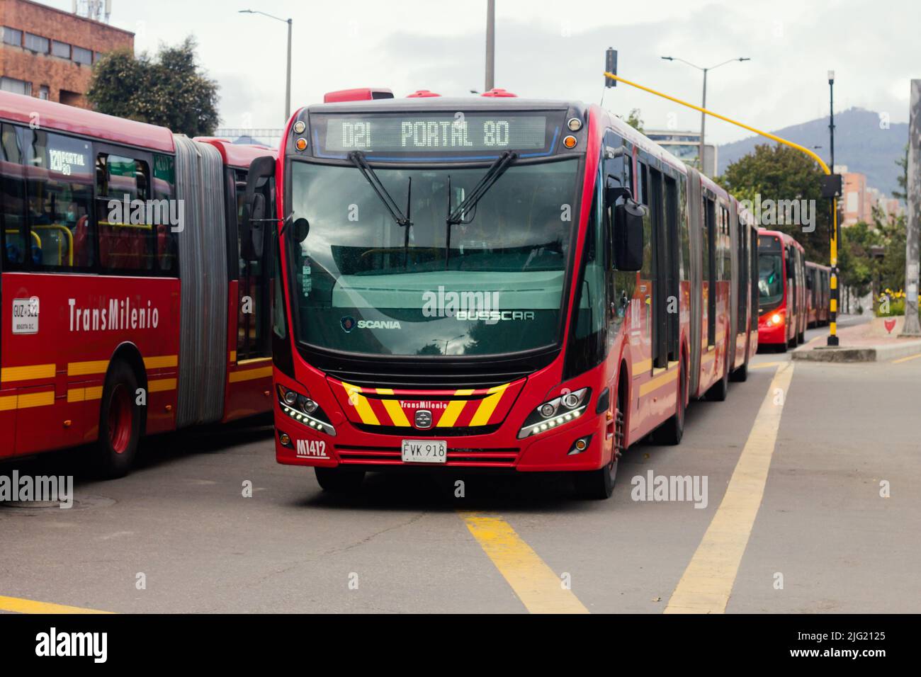 Avenida Calle 80, Bogotá Colombia, buses of the massive Transmilenio ...