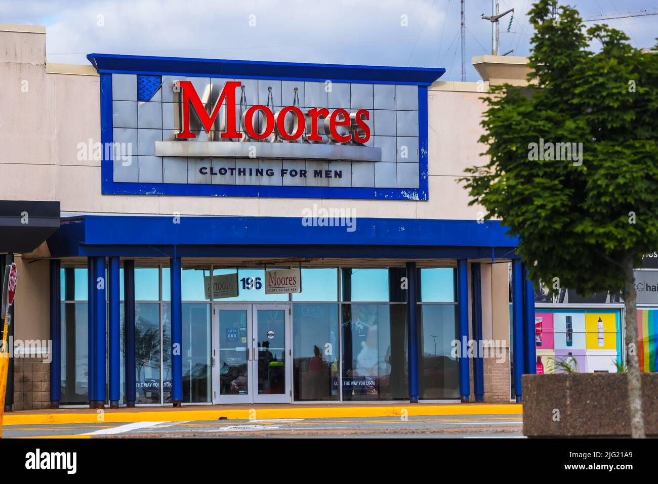 Moores banner at storefront. aka Moores the Suit People and Moores ...