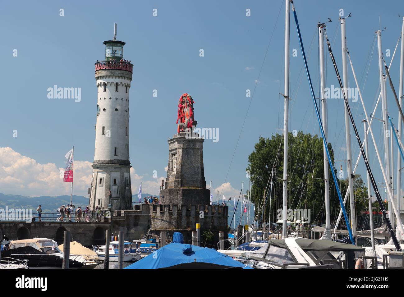 Lindau harbour with landmark lighttower and bavaria lion. bavaria lion ...