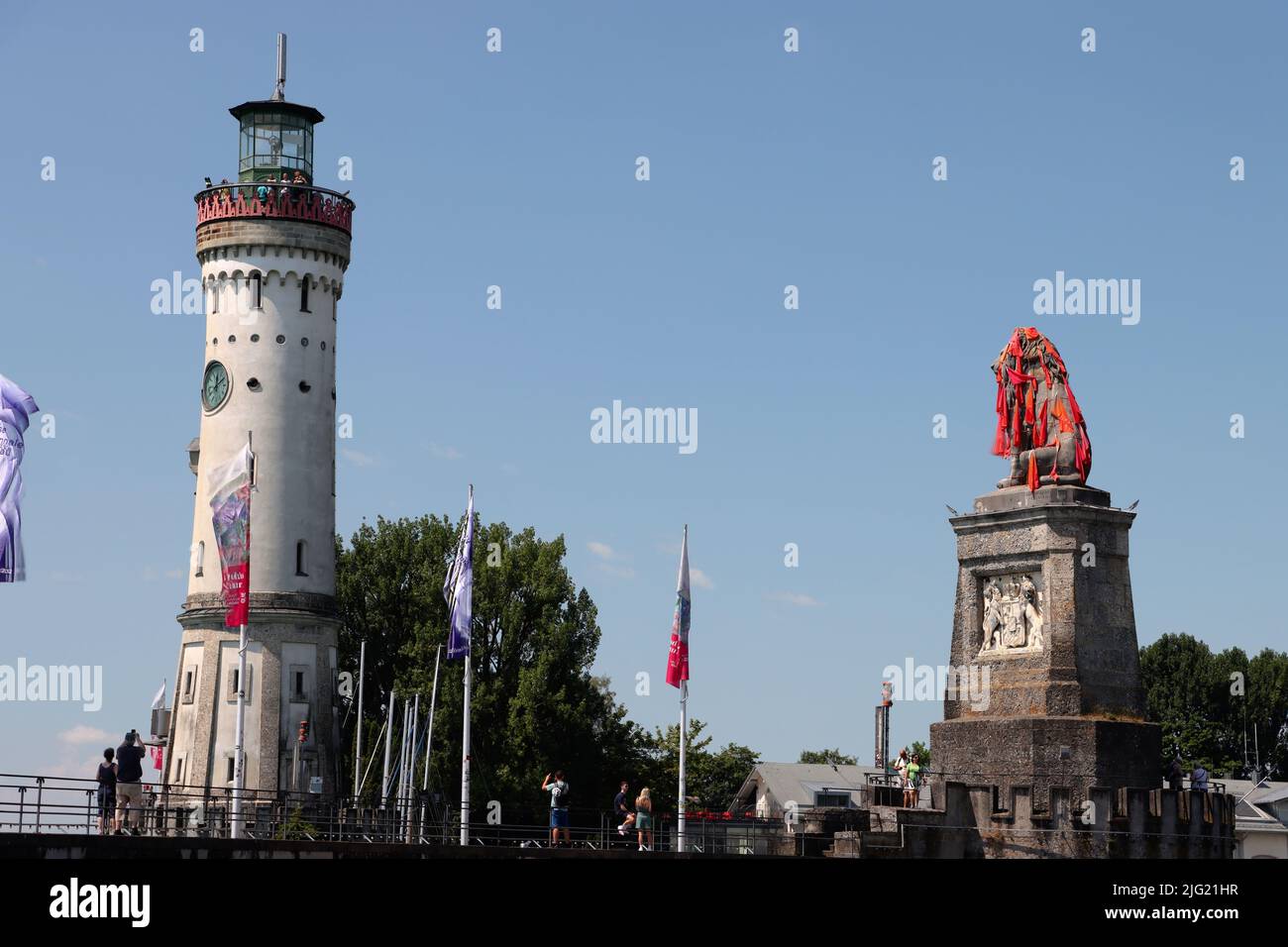 Lindau harbour with landmark lighttower and bavaria lion. bavaria lion ...