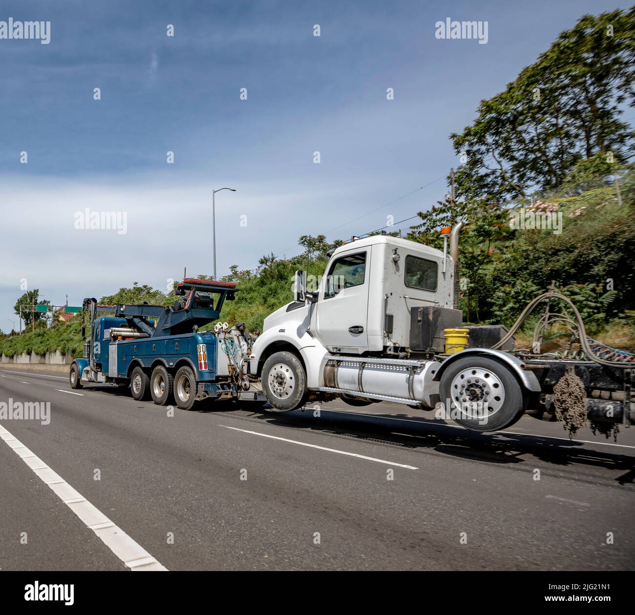 Powerful mobile helper heavy duty blue big rig towing semi truck ...