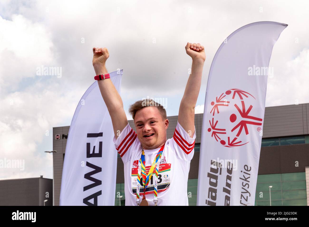 An athlete from Poland celebrates after receiving a medal during the ...