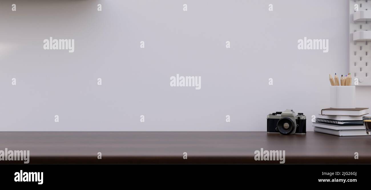 Workspace with film camera, book, stationery and copy space for montage ...