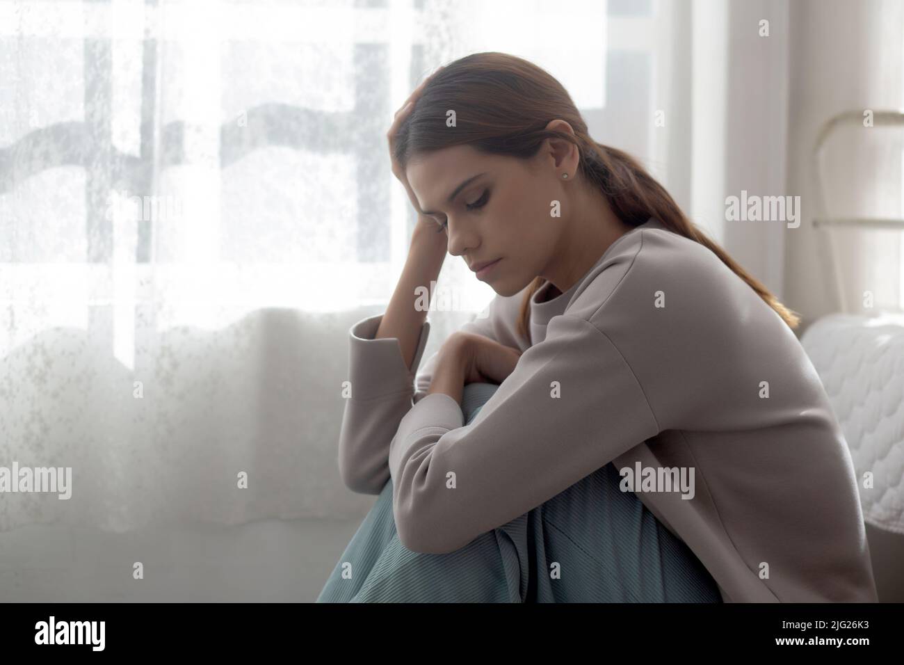 Young caucasian woman is depression and having mental problem in the ...