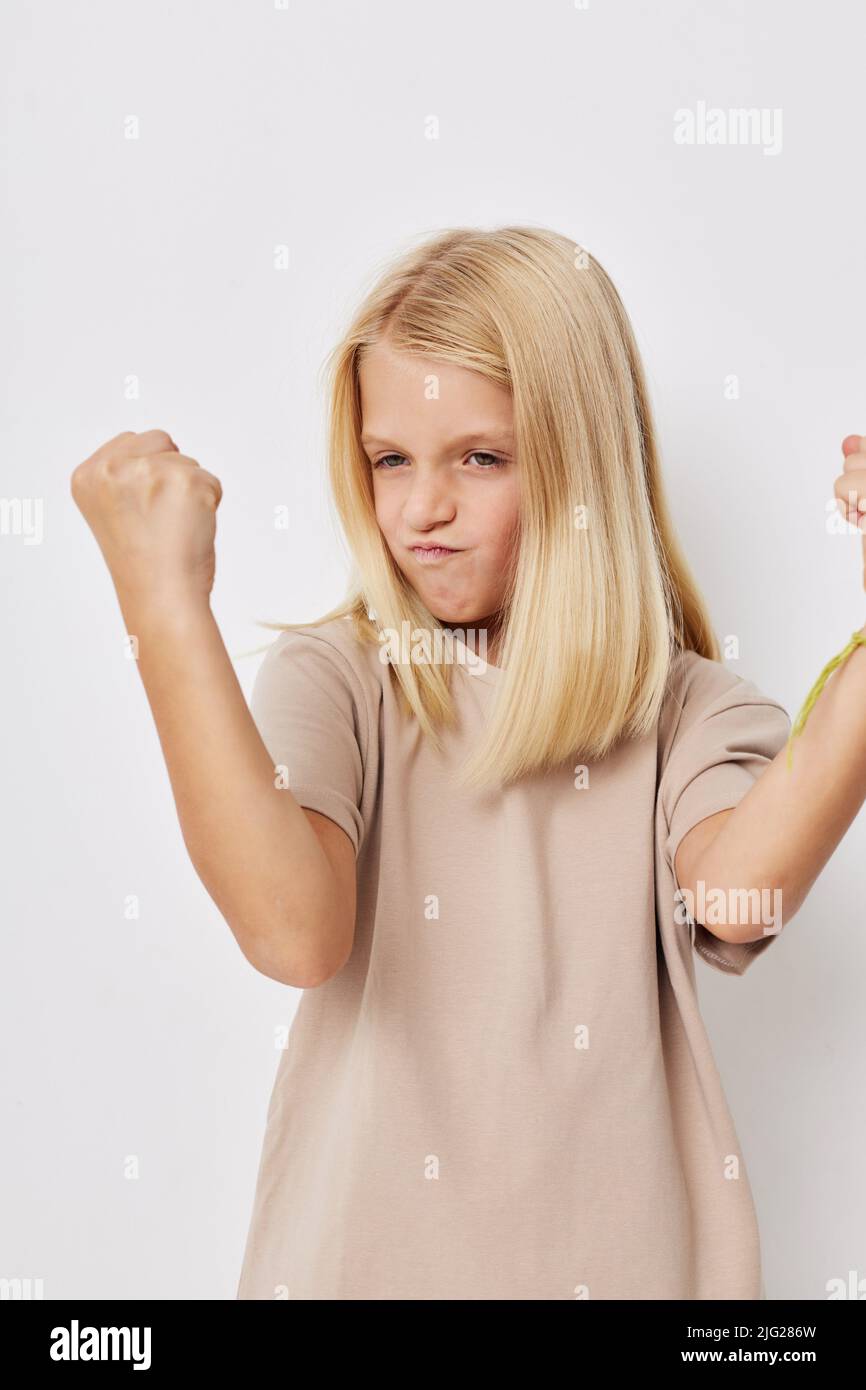 Beautiful little girl hand gesture fun fashion cropped view Stock Photo ...