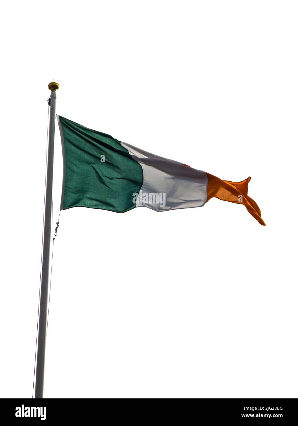 An Irish tricolour flag flies in the wind over Ireland Stock Photo - Alamy