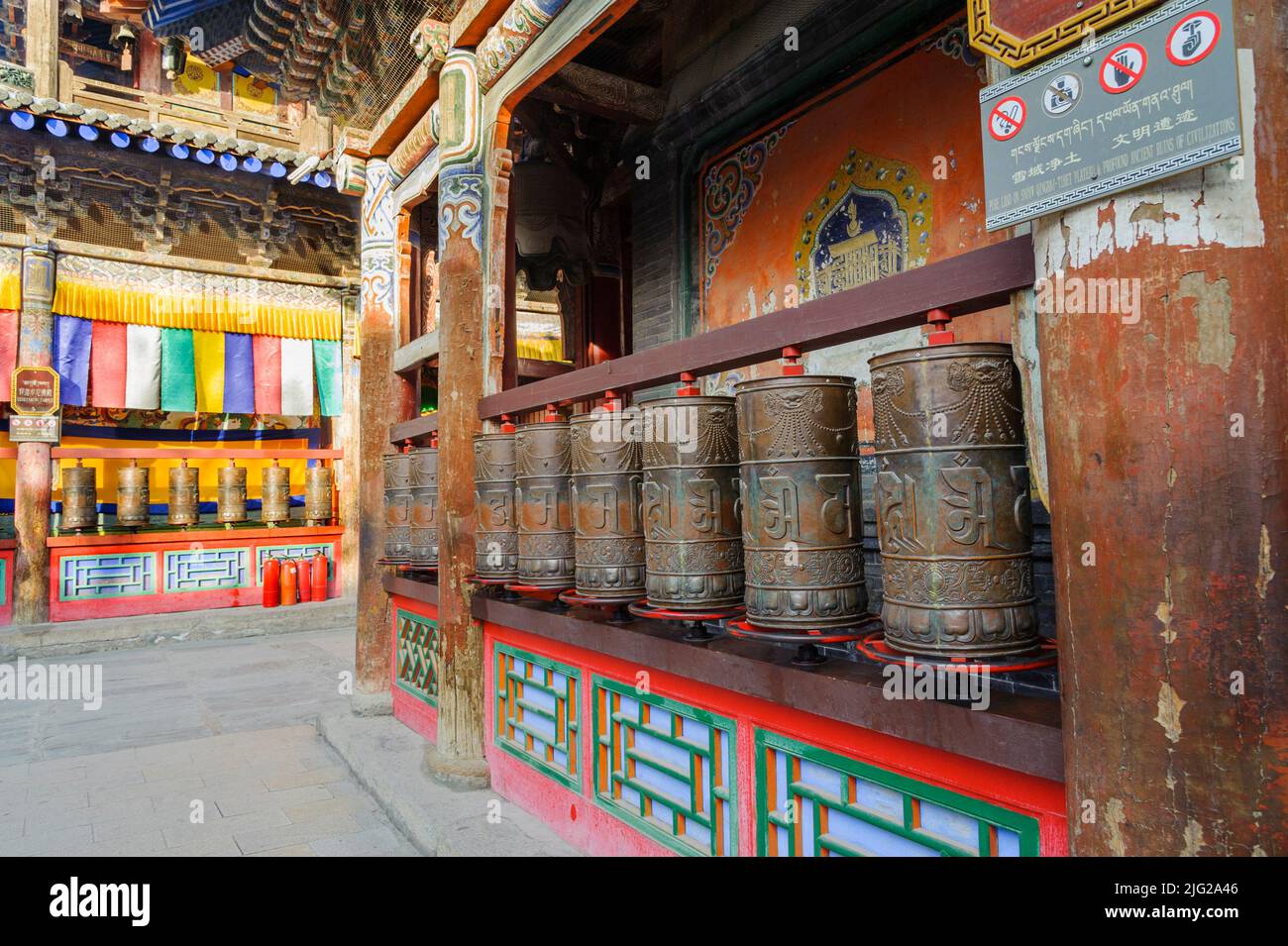 Prayer wheels are placeda round the Ta'er Monastery in Xingin, Qinghai ...