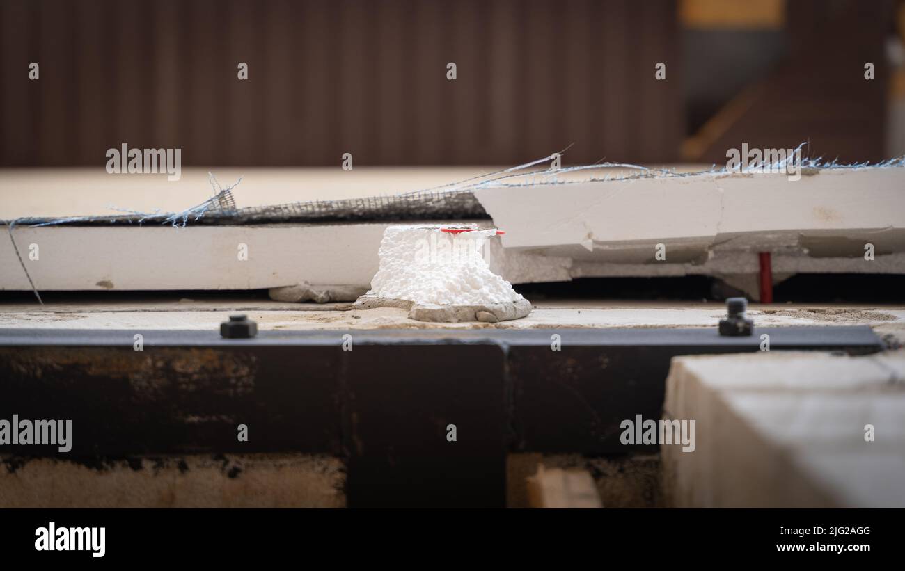 Torn polystyrene foam from the facade of the house Stock Photo - Alamy