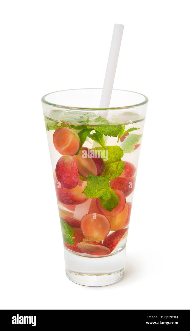 Cold fresh detox beverage of red grapes, mint leaves with water in a ...