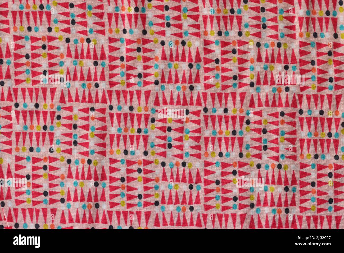 Bright colourful cotton fabric with geometric shapes and figures Stock ...