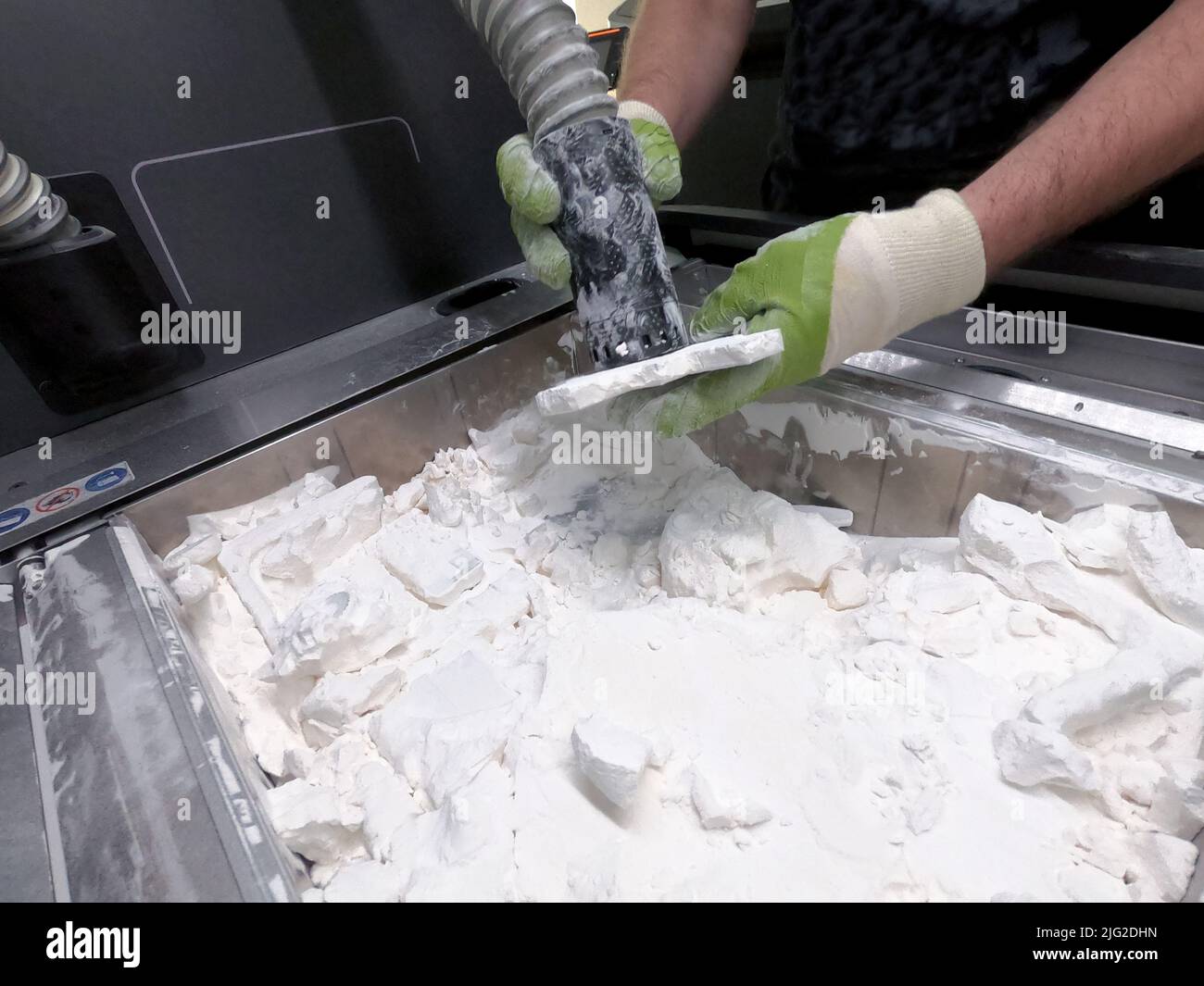 Engineer or artist designer printing 3D parts and shaping models from ...