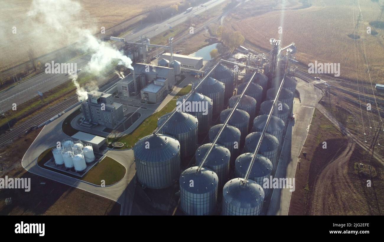 Aerial Drone View Flight Over complex of grain elevator buildings ...