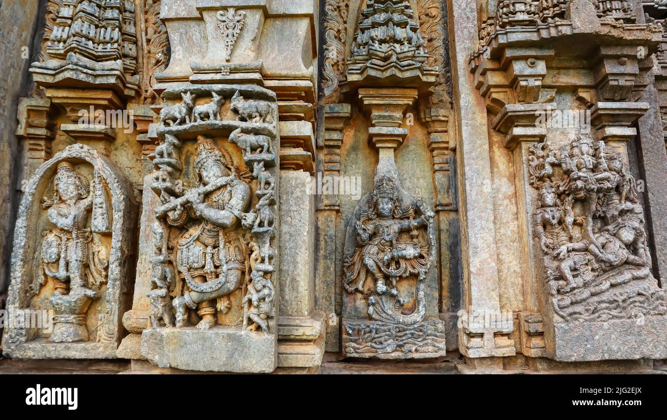 Sculptures of Lord Krishna playing a flute and dancing on Kaliya Snake ...
