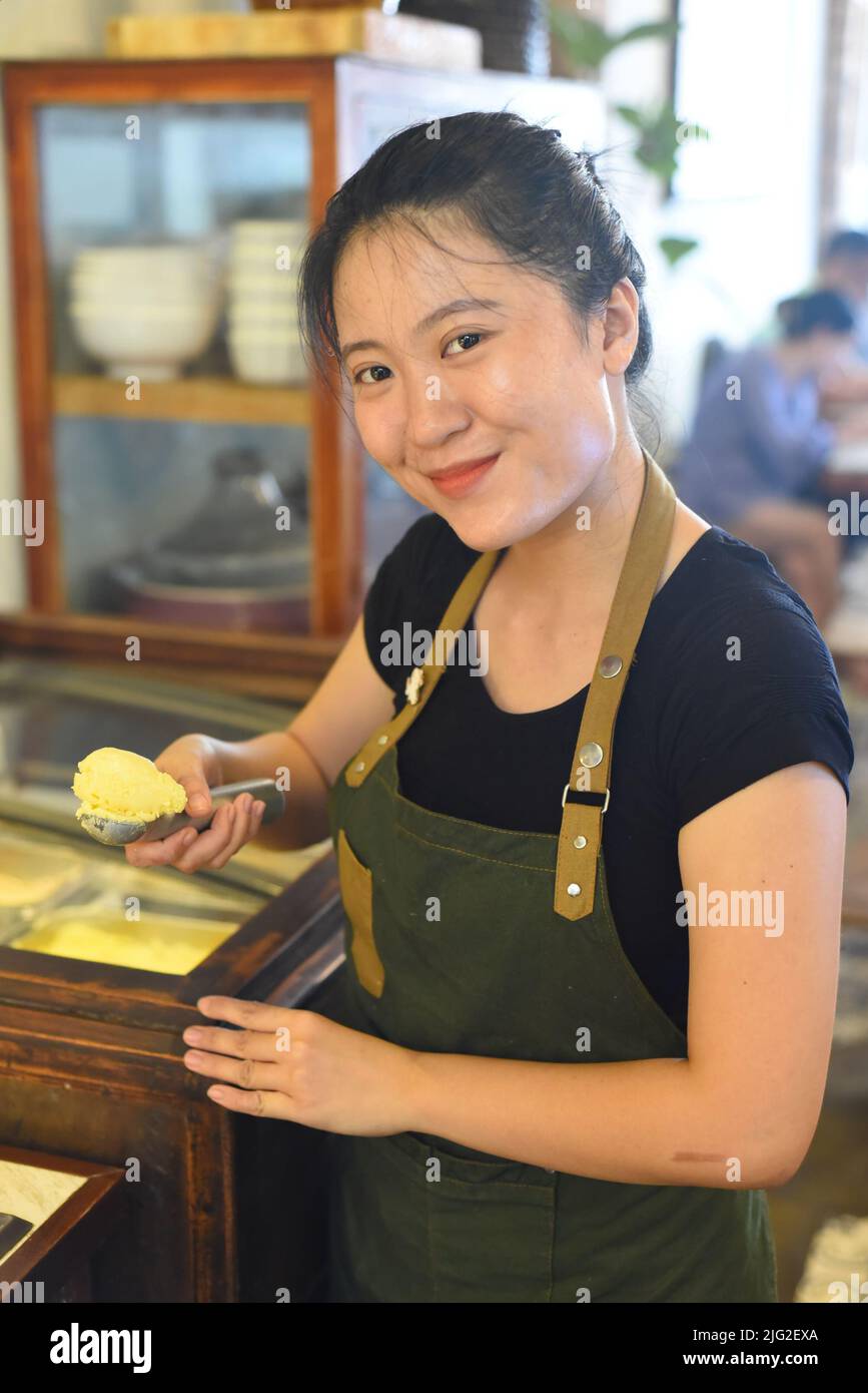 Vietnam cafe waitress hi-res stock photography and images - Alamy