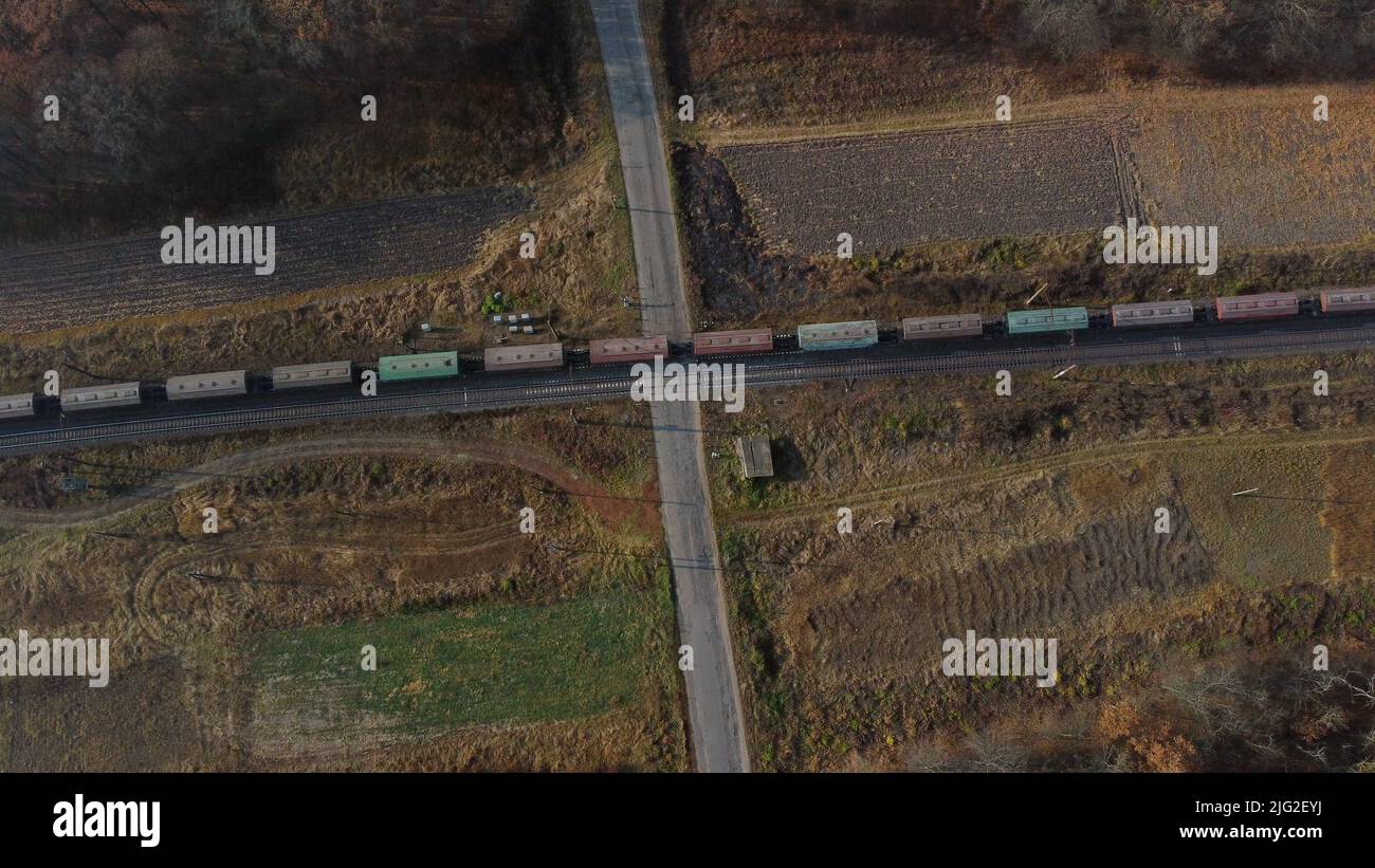 Top View Freight Train Passing Railway Crossing. Aerial Drone View ...