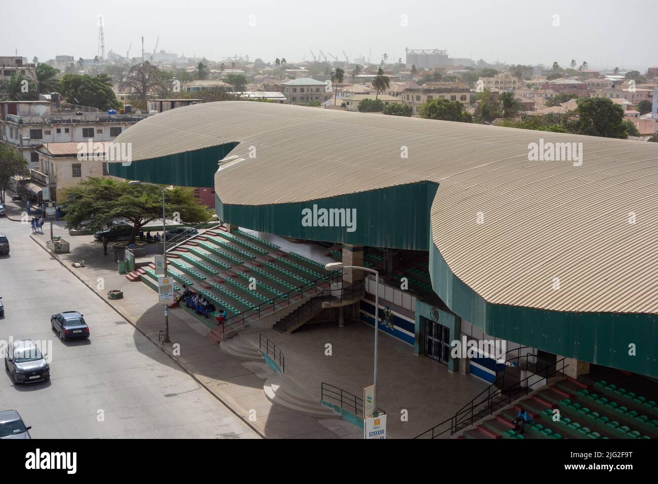 BANJUL, THE GAMBIA - FEBRUARY 10, 2022 stadium seating next to Arch 22 ...