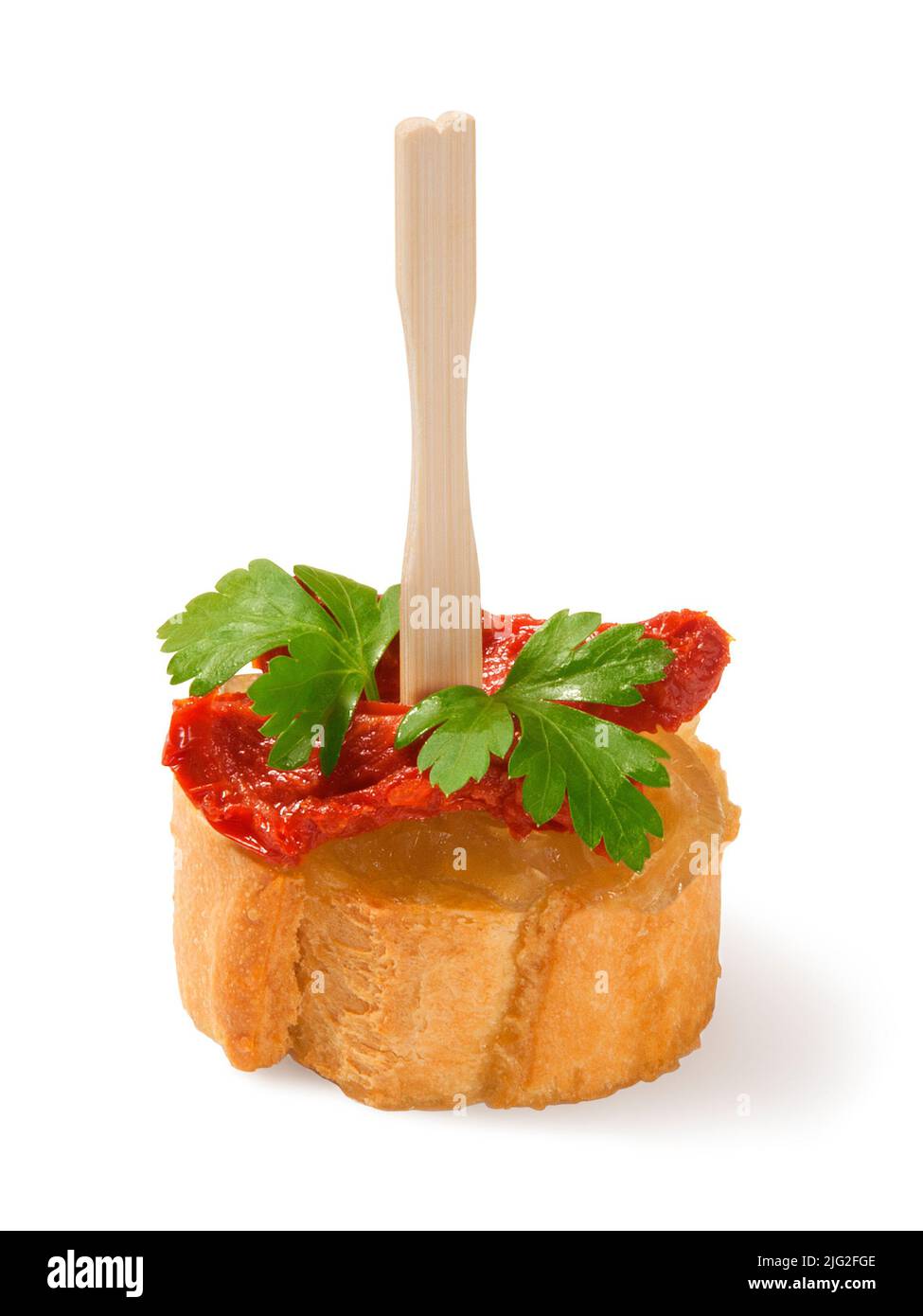 tapas with sun-dried tomatoes and sauce isolated Stock Photo - Alamy