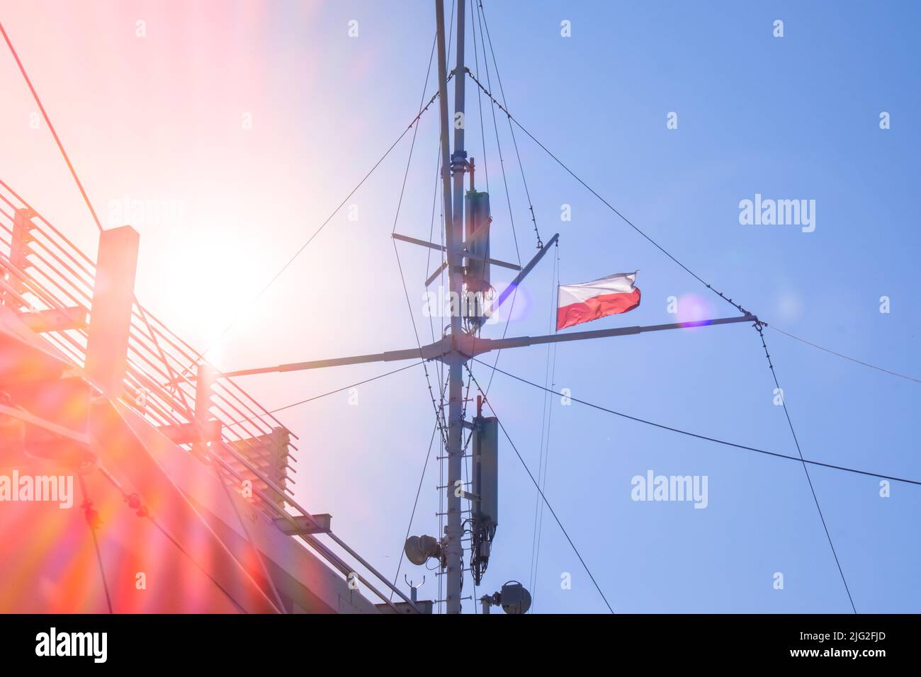 Flag of Poland waving on flag pole of ship. Polish flag fluttering ...