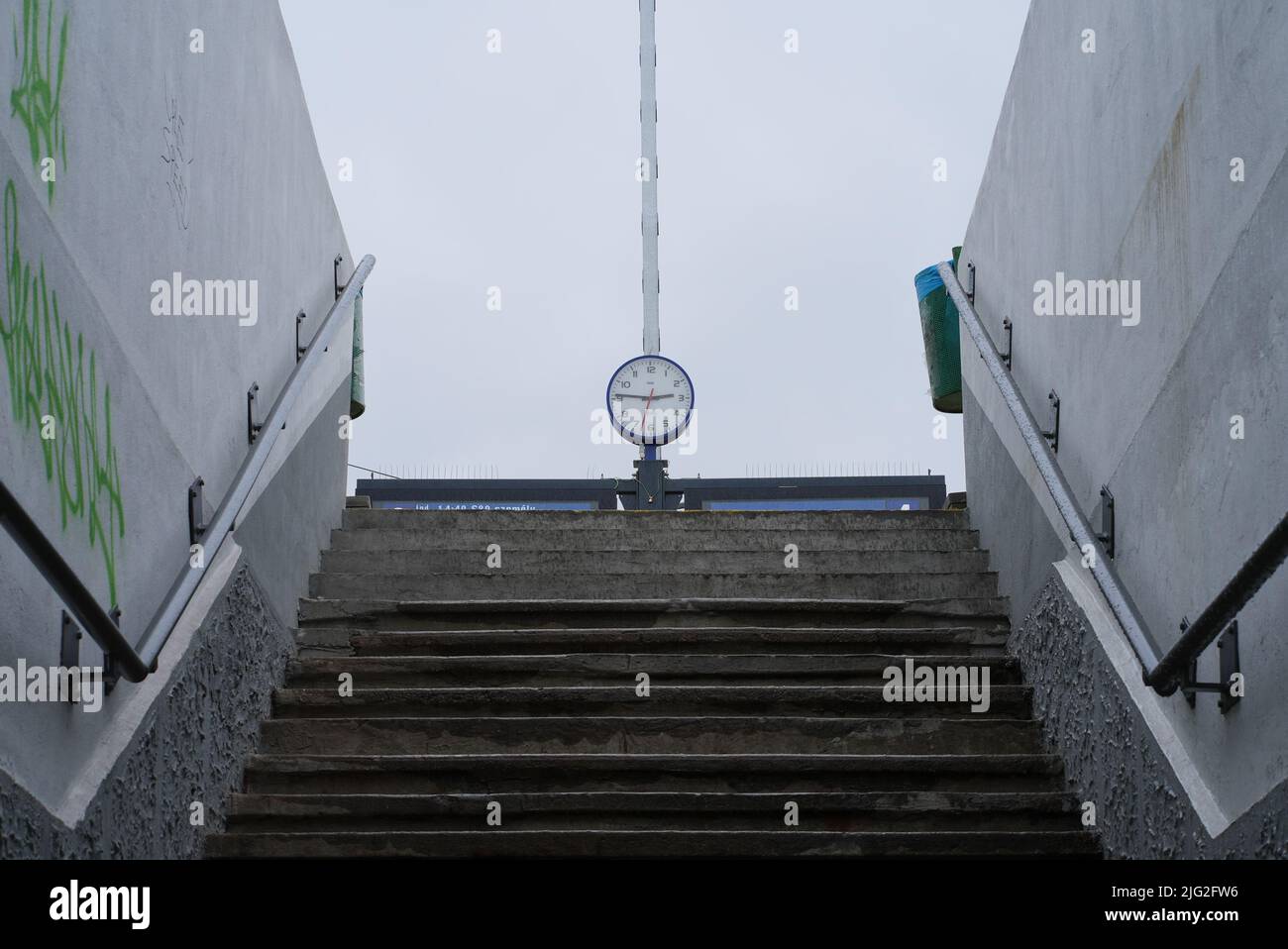 Clock at a train station upstairs steps Stock Photo - Alamy