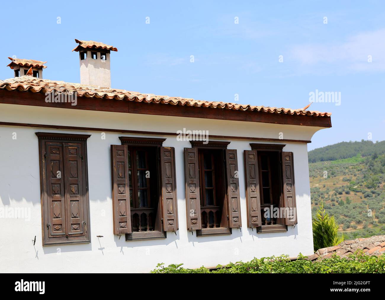 Greek Home with Brown Window shutters and View in Old Greek Village in ...