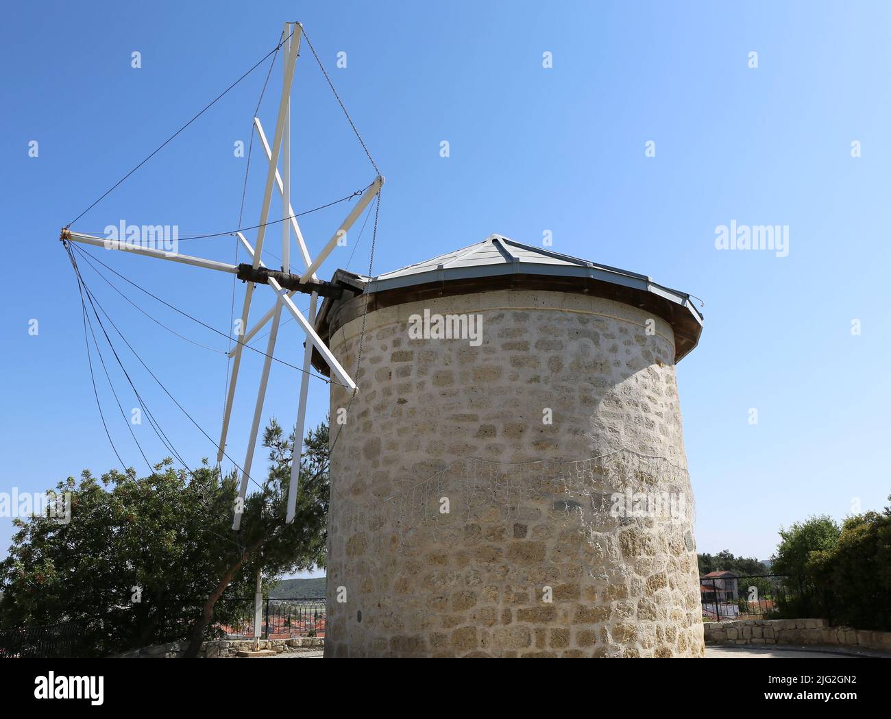 Old Greek Windmill with Trees and Blue Sky in Alacati, Izmir, Turkey ...