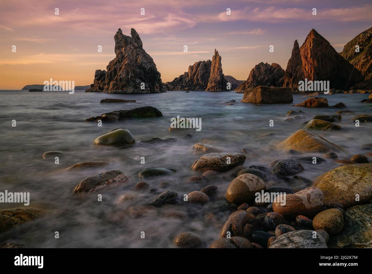 Mangersta sea stack at sunset located on the Isle of Lewis, Outer ...