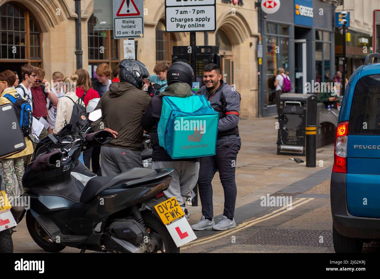 Deliveroo drivers in the centre of Oxford, Oxfordshire, England, UK ...