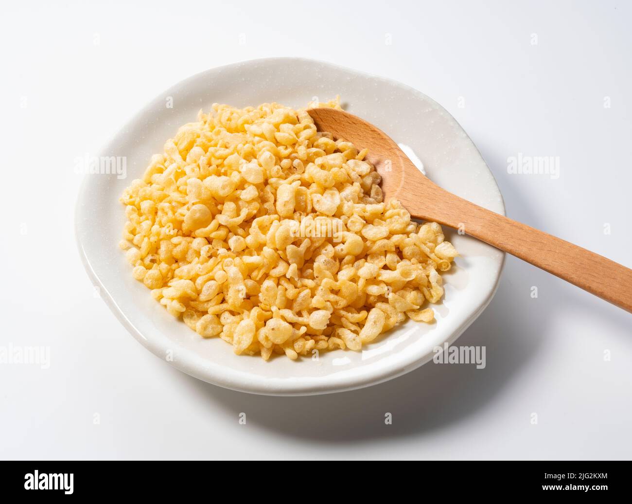 Tenkasu served on a plate placed on a white background. Image of ...