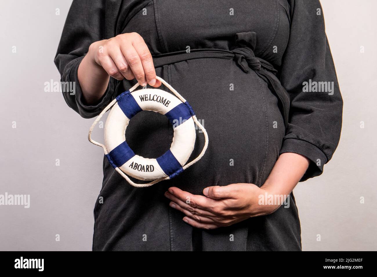 Welcome Aboard. Expecting a baby. Pregnant woman Stock Photo - Alamy