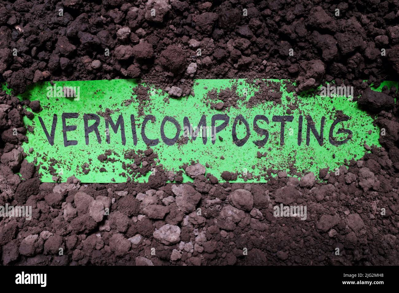 Vermicomposting organic farming concept. Written text word on soil ...
