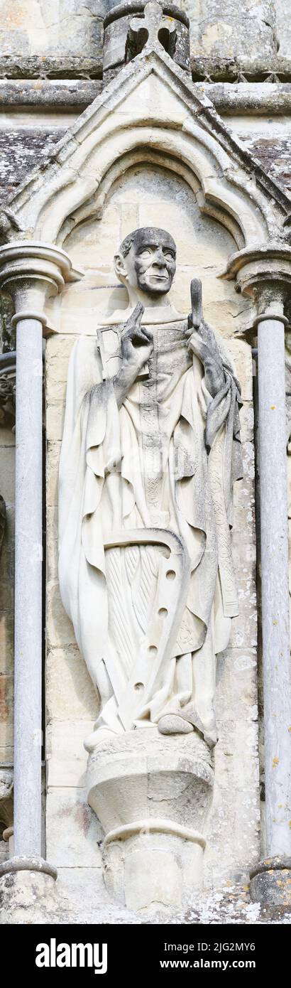 Statue of a bishop, on the west front of the medieval christian ...